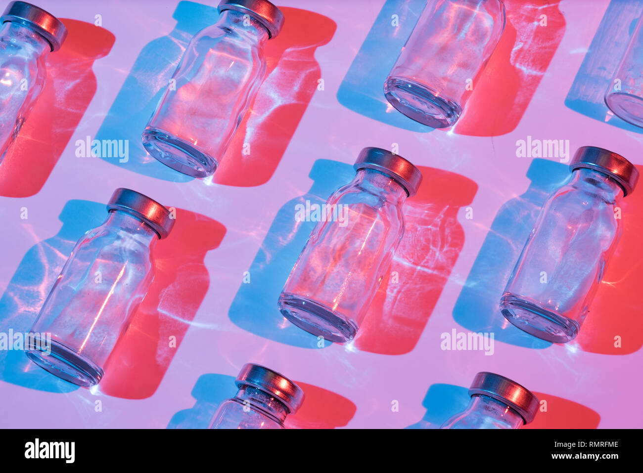 Bottles for injection with white powder on a color background Stock ...