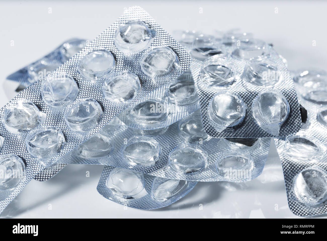 A pile of used empty pill packs Stock Photo - Alamy