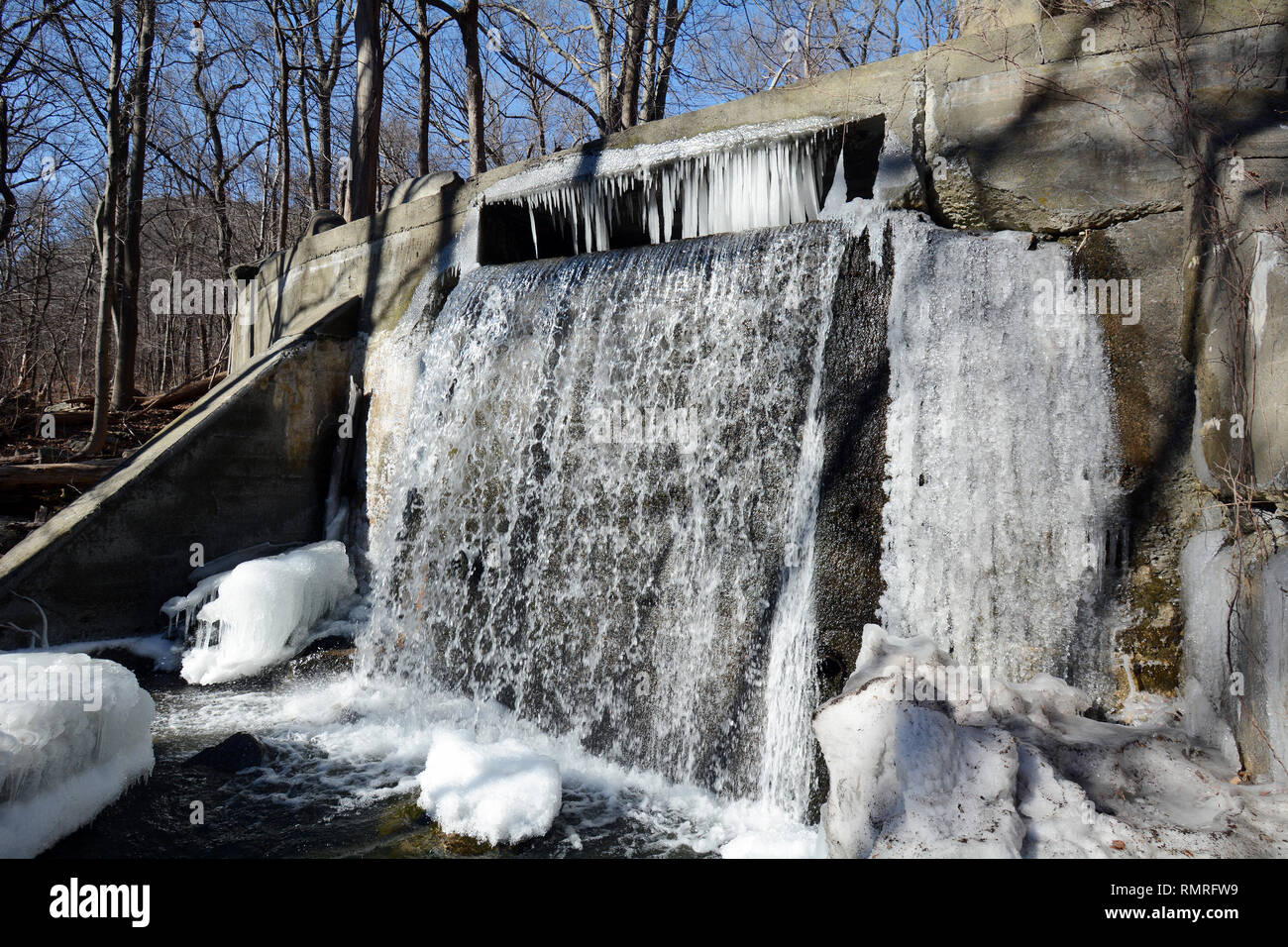 Concrete Weir with Waterfall In the Forest Stock Photo - Alamy
