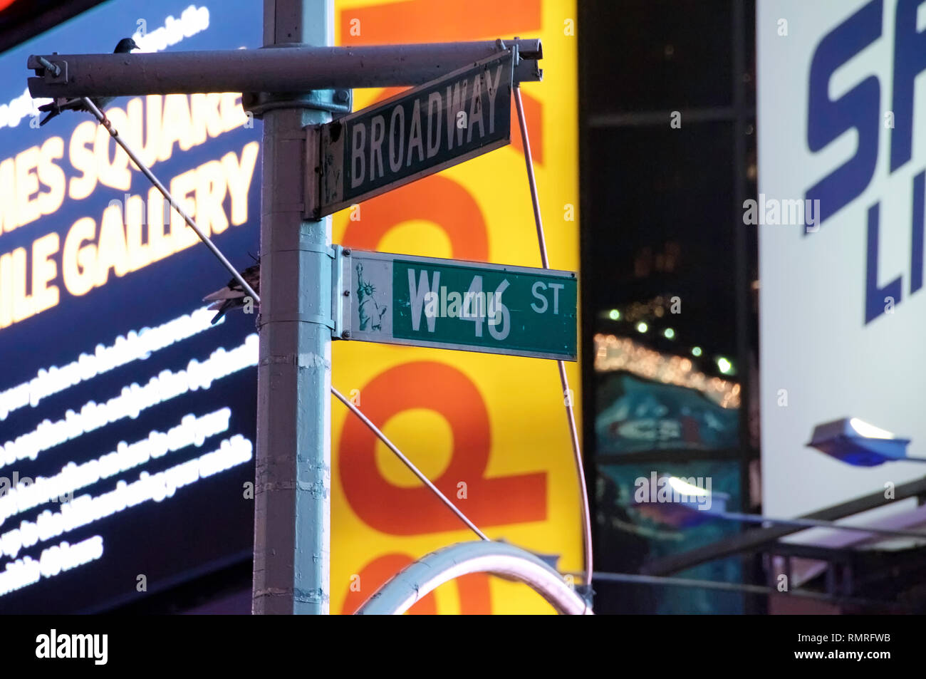 A close-up look of a street intersection sign at New York City's Time ...
