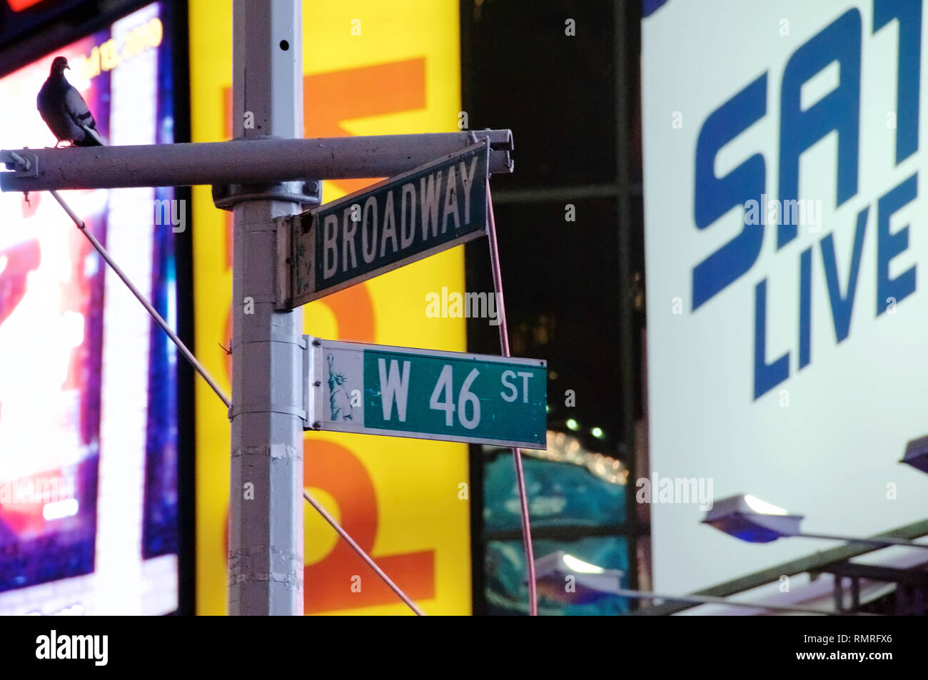 A close-up look of a street intersection sign at New York City's Time ...