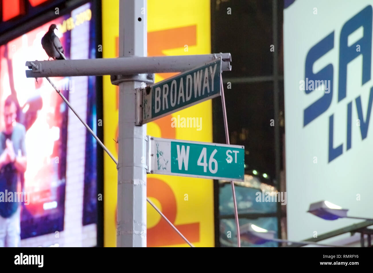 A close-up look of a street intersection sign at New York City's Time ...