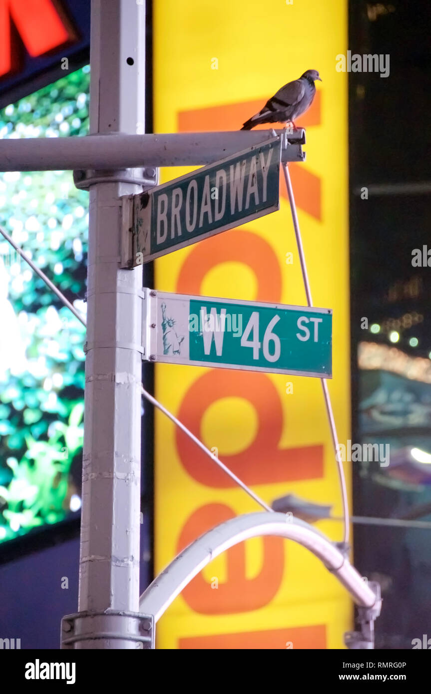 A close-up look of a street intersection sign at New York City's Time ...