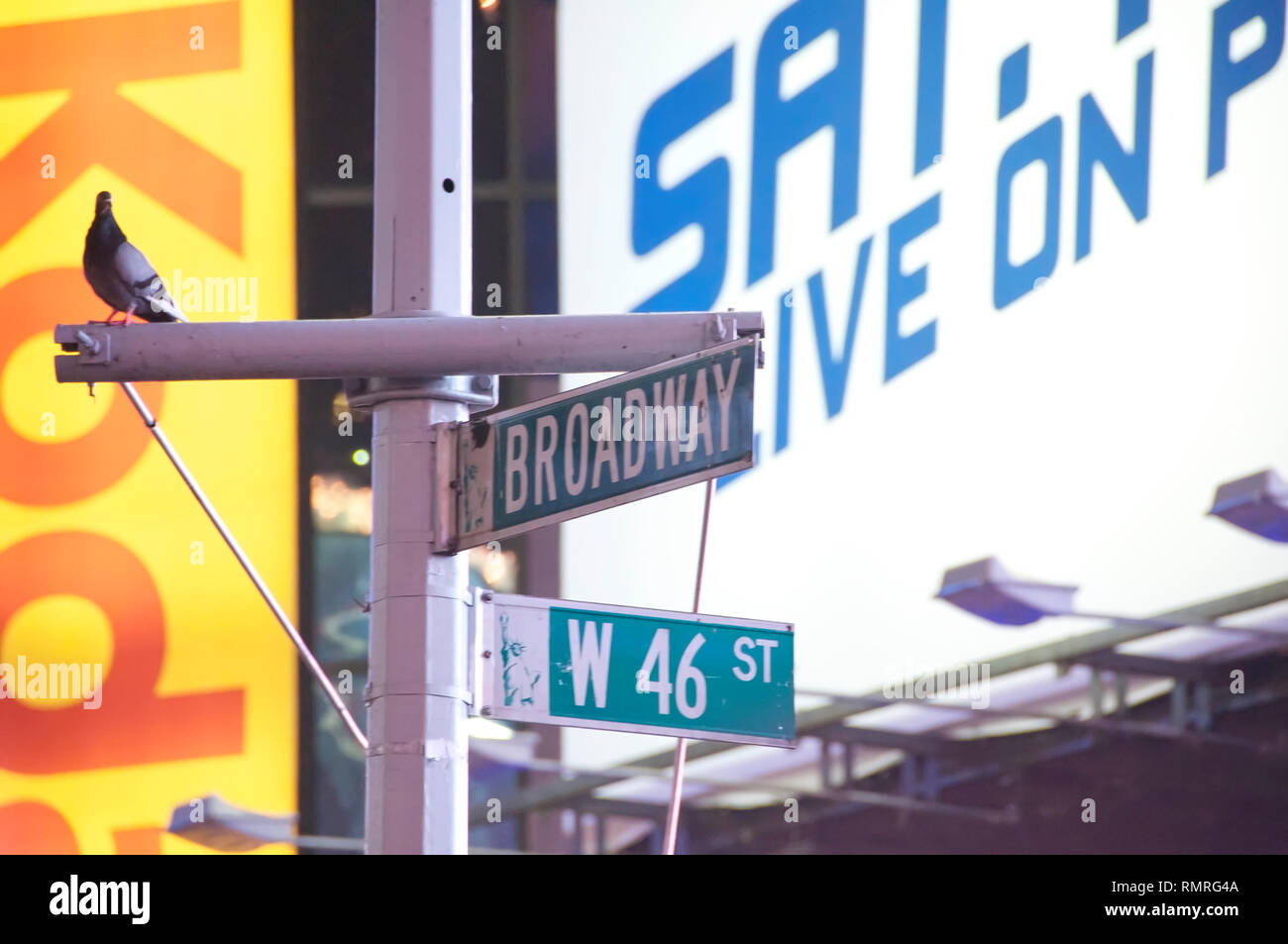 A close-up look of a street intersection sign at New York City's Time ...