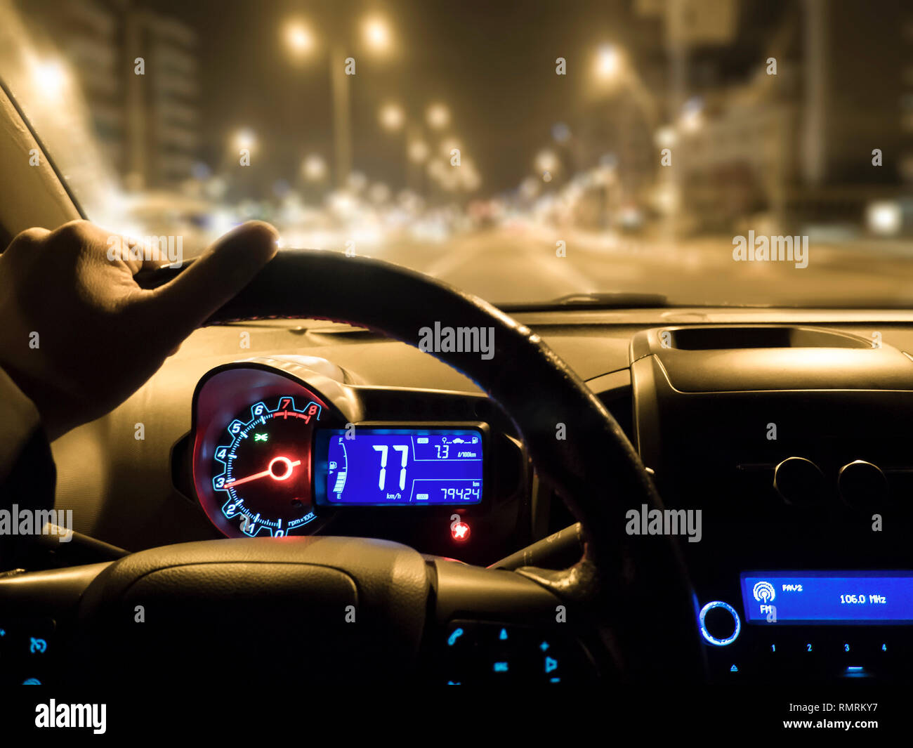 Man Driving Car At Night