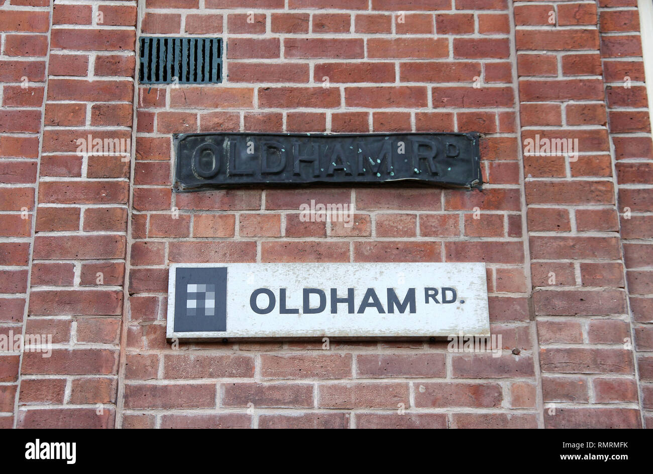 Old and New Oldham Road signs in Manchester Stock Photo - Alamy