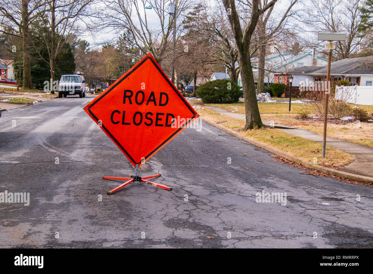 Orange sidewalk closed sign hi-res stock photography and images - Alamy