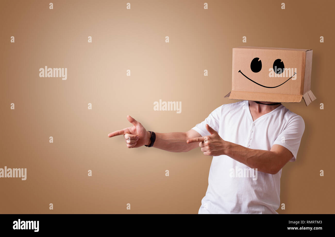 Man with cardboard box head Stock Photo - Alamy