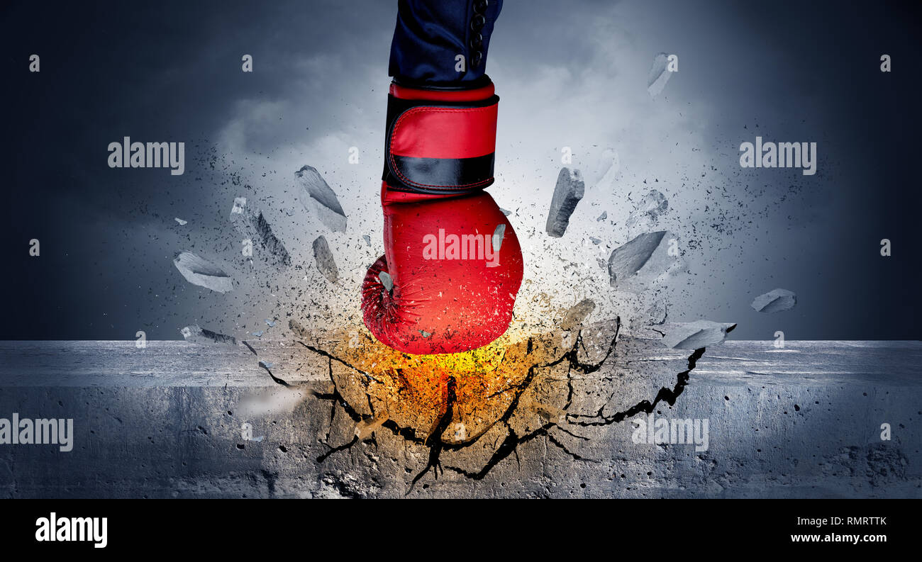 Big hand hits intense and breaks a crass stonewall Stock Photo - Alamy