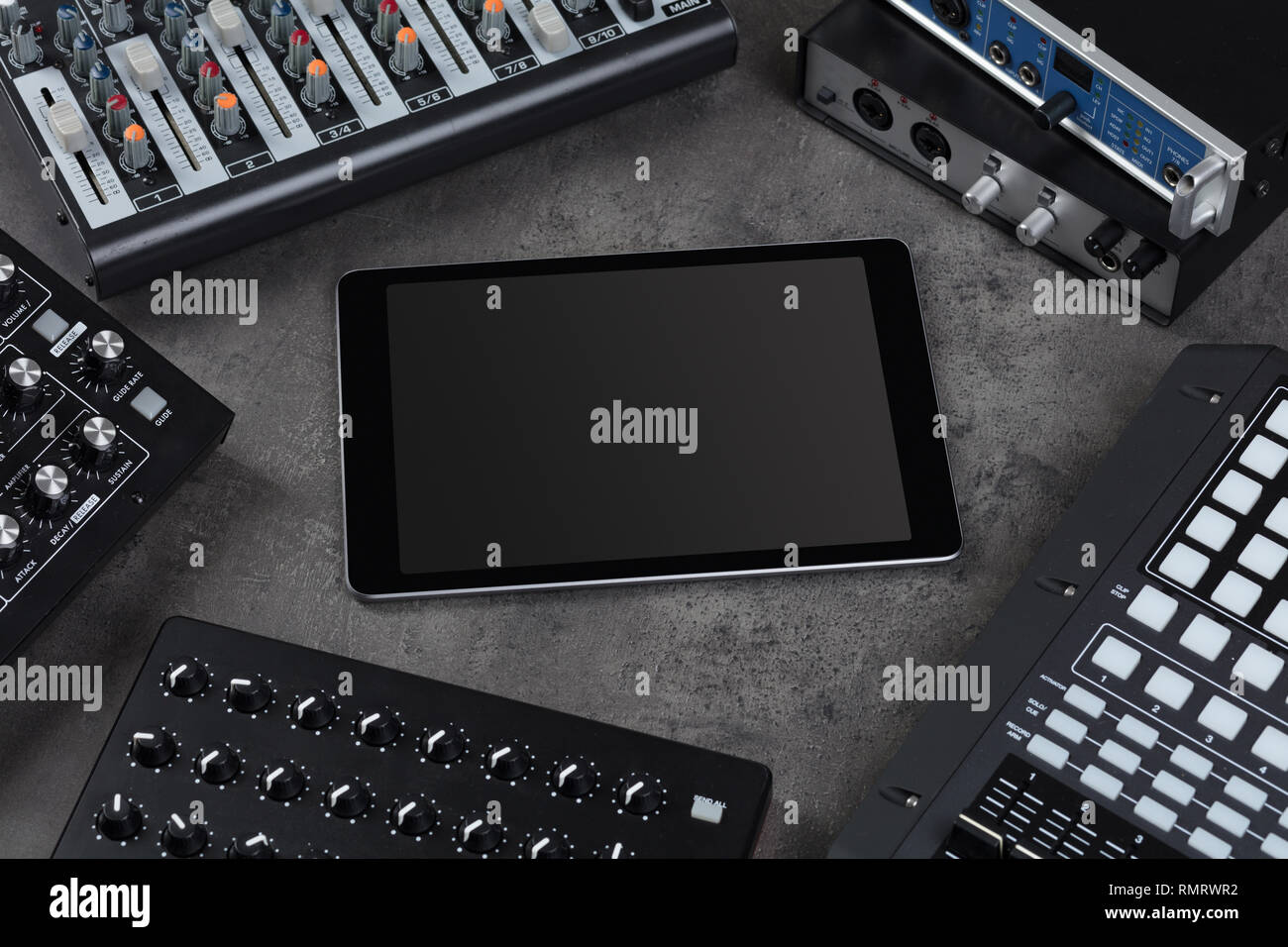 Empty tablet and electronic music instruments Stock Photo - Alamy