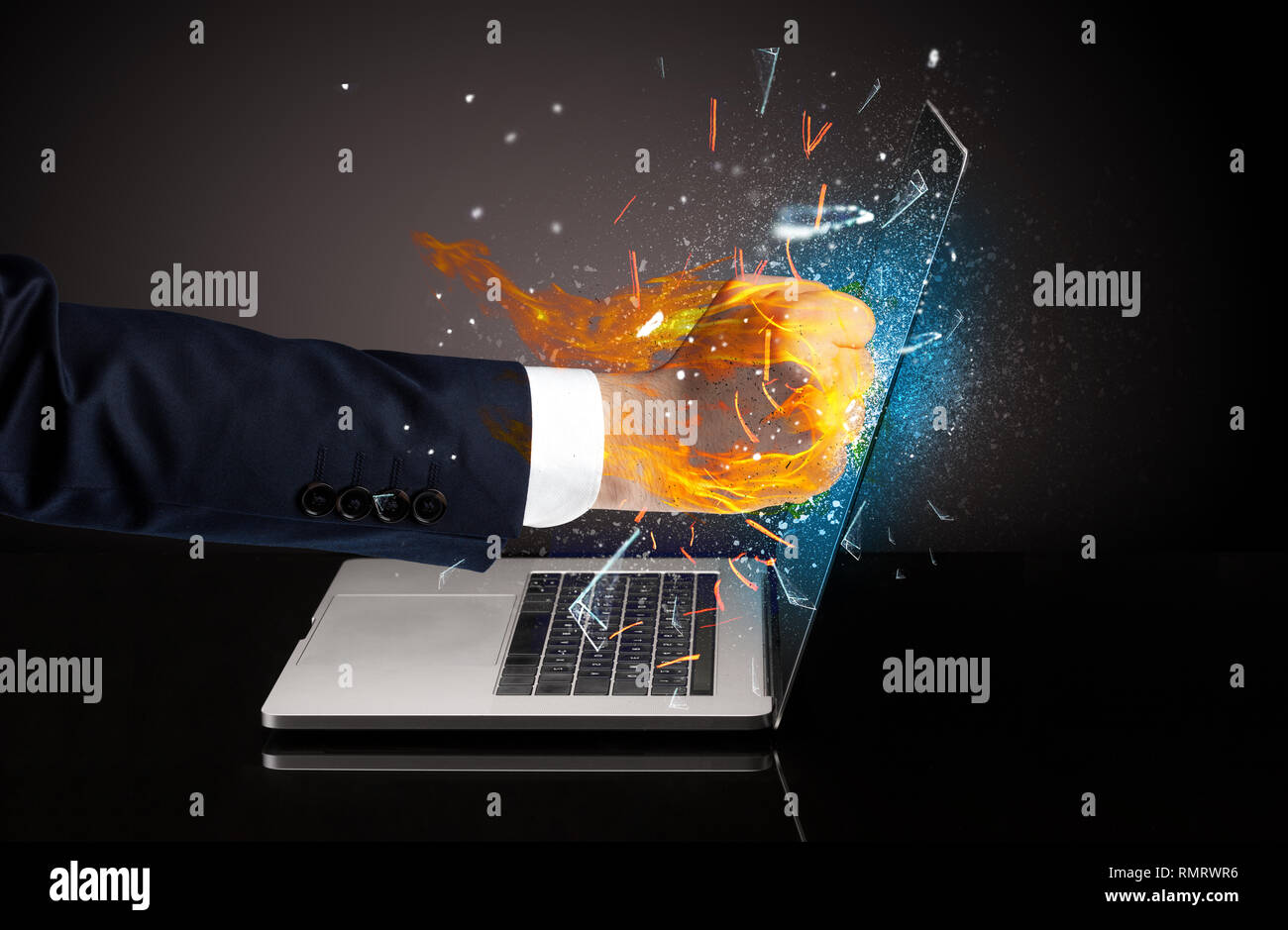 Firing hand hitting strongly laptop screen glass Stock Photo - Alamy
