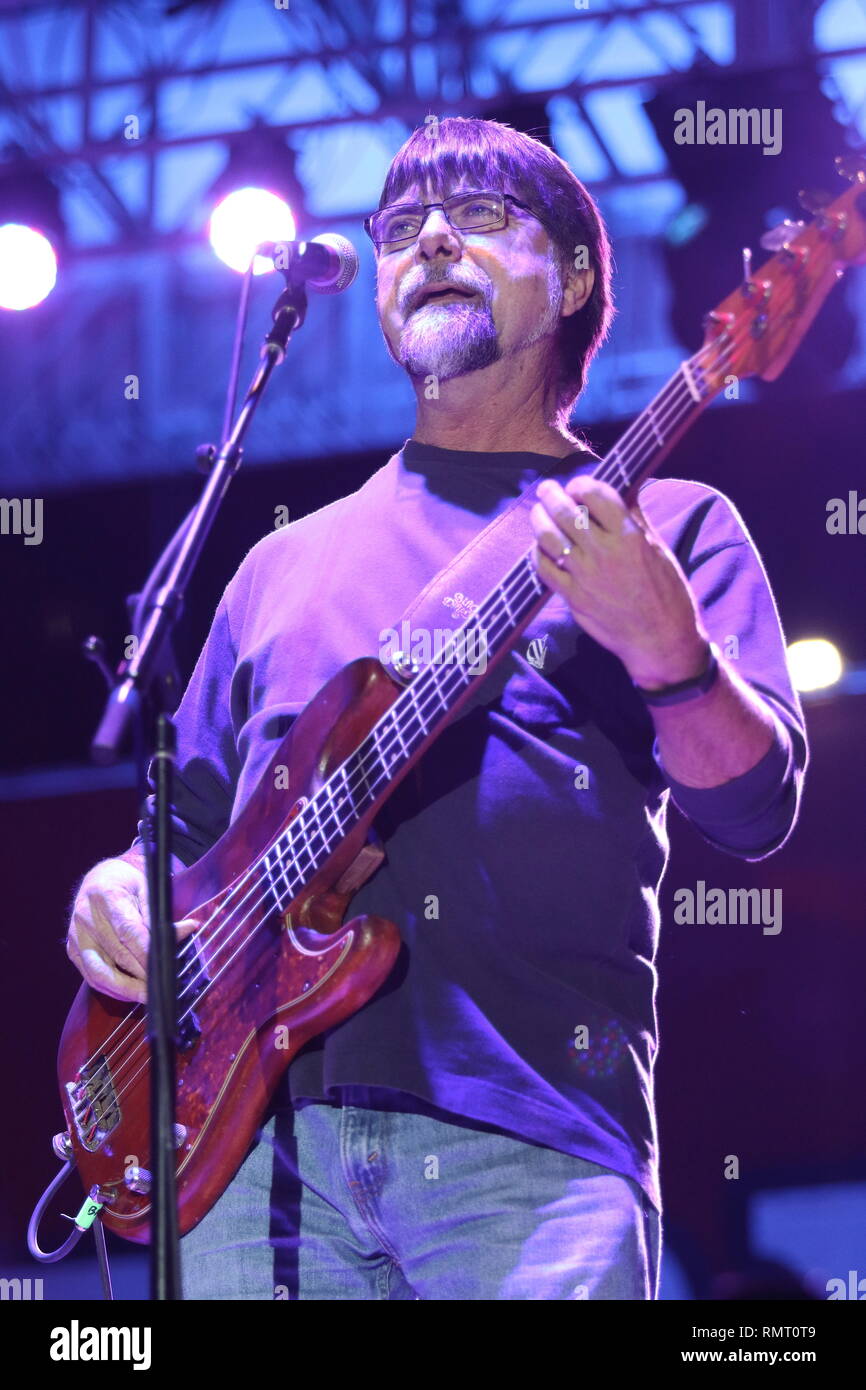 Bass guitarist Teddy Gentry is shown performing on stage during a "live ...