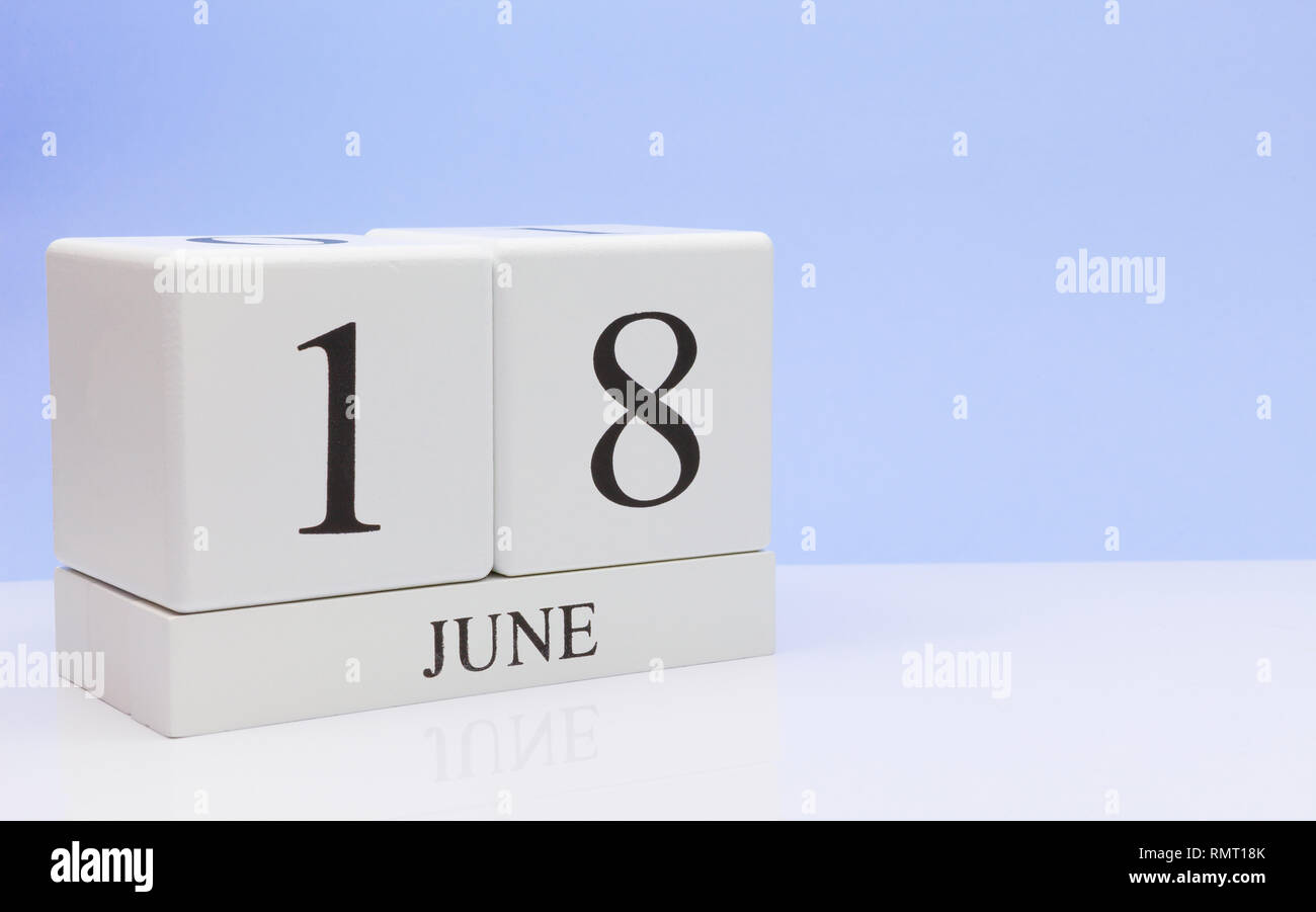 June 18st. Day 18 of month, daily calendar on white table with ...