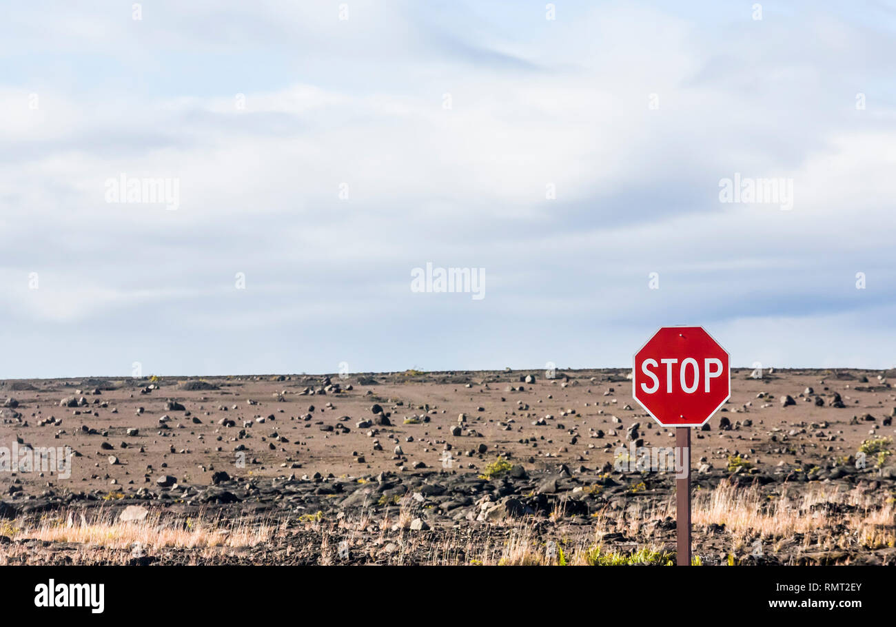 Stop sign and barren landscape in Hawaii Volcanoes National Park near ...