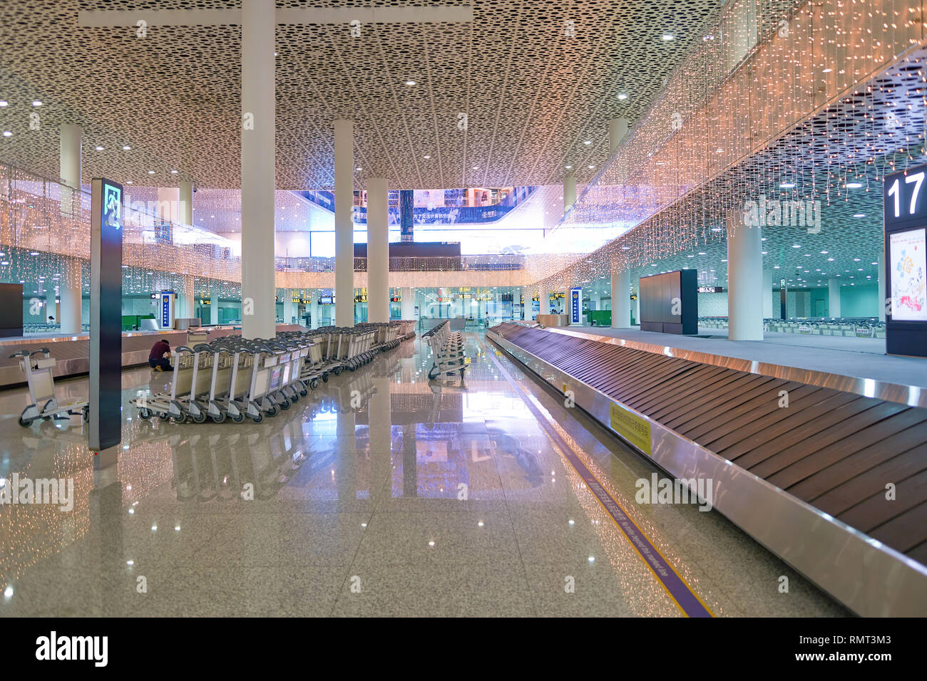 SHENZHEN, CHINA - CIRCA MAY, 2016: baggage claim area at Shenzhen Bao'an International Airport ...