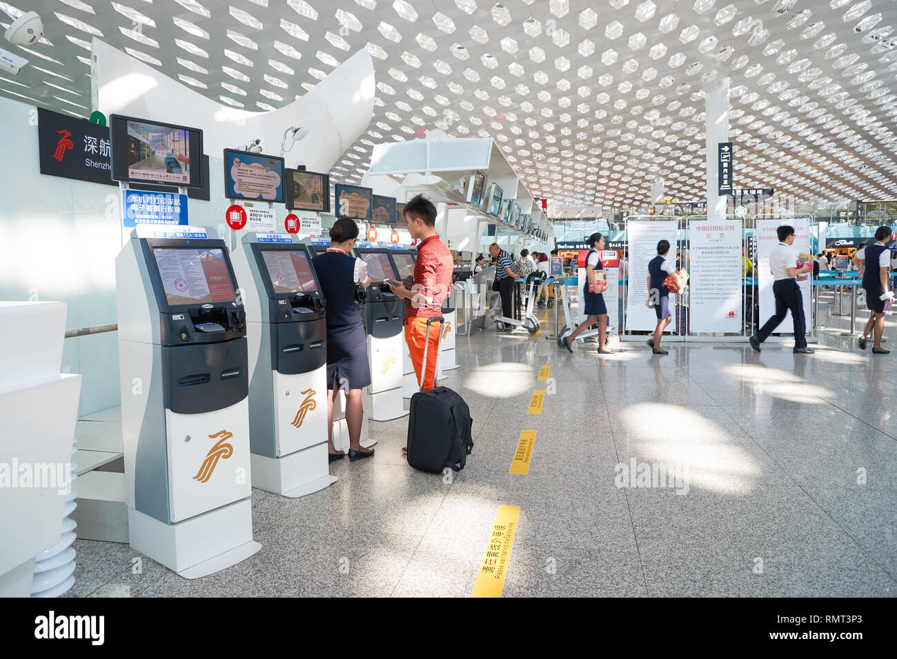 SHENZHEN, CHINA - CIRCA MAY, 2016: self check-in kiosks in Shenzhen Bao ...