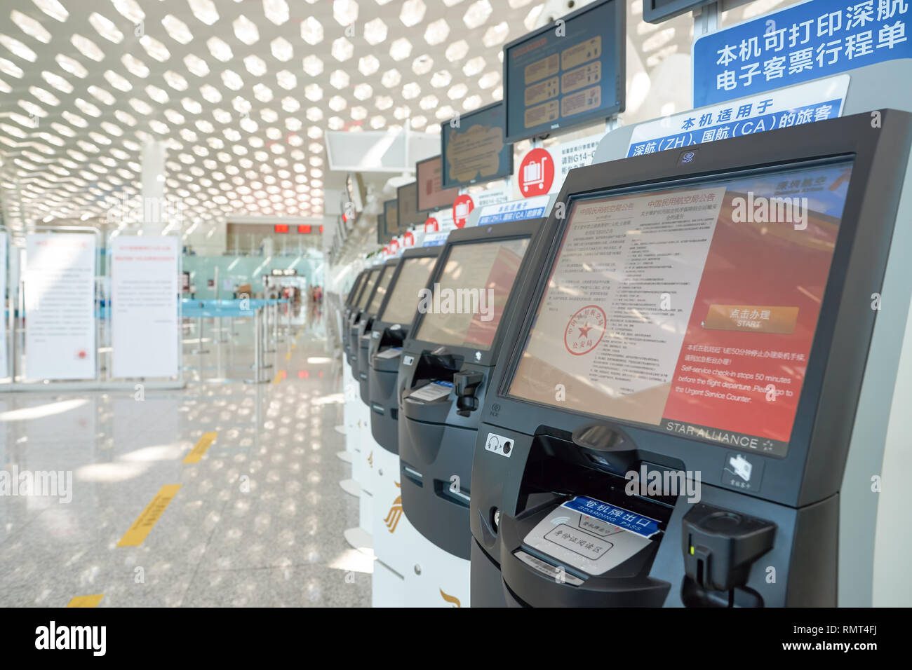 SHENZHEN, CHINA - CIRCA MAY, 2016: self check-in kiosks in Shenzhen Bao ...