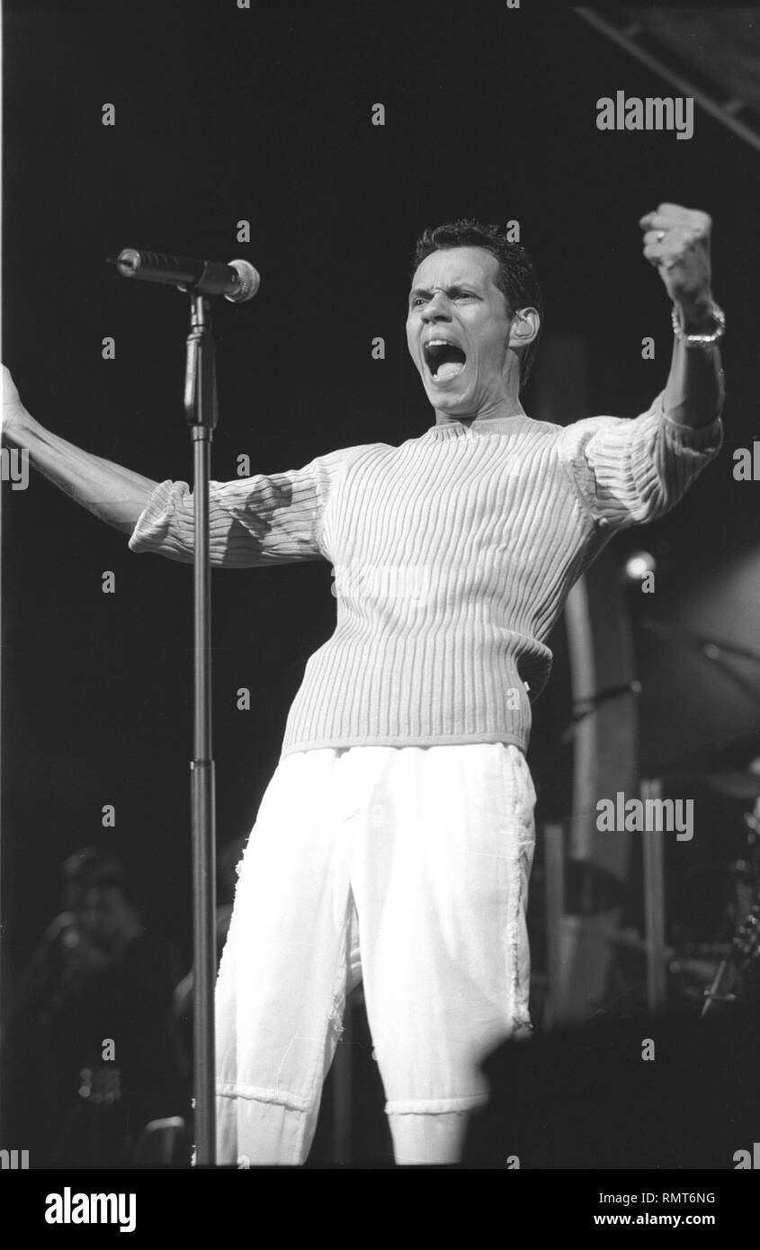 Singer Marc Anthony is shown performing on stage during a "live ...