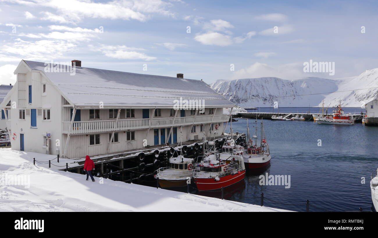 Sunny Arctic harbour surrounded by snow covered mountains, Norway Stock ...