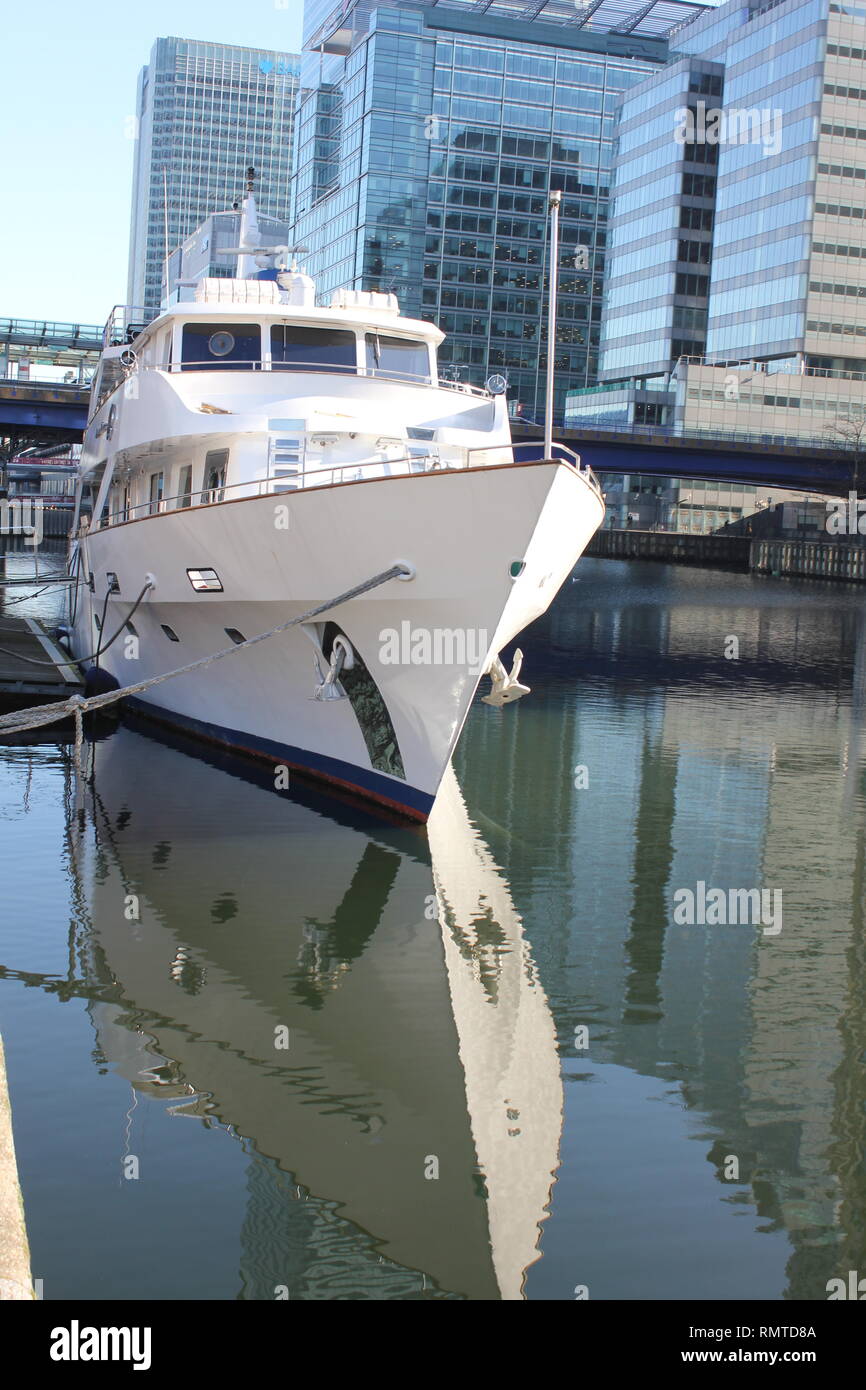 West India Dock Quay boat moored on River Thames Stock Photo - Alamy