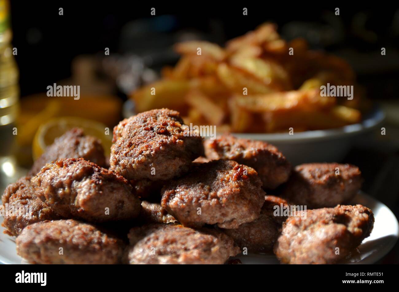 Meatballs and French fries Stock Photo - Alamy