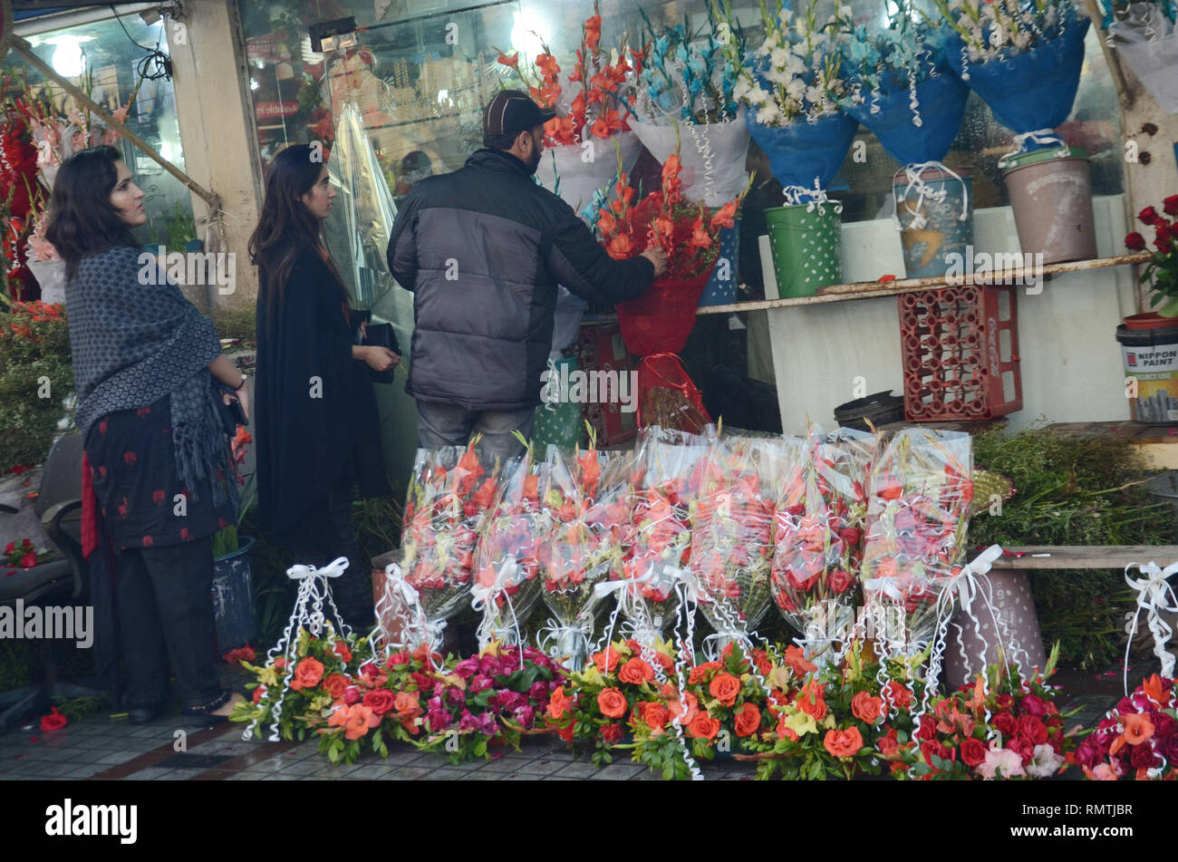 Lahore, Pakistan. 14th Feb, 2019. Pakistani people purchasing fresh ...