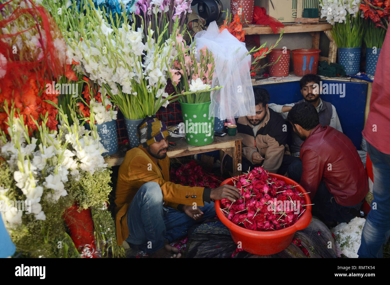 Lahore, Pakistan. 14th Feb, 2019. Pakistani people purchasing fresh ...