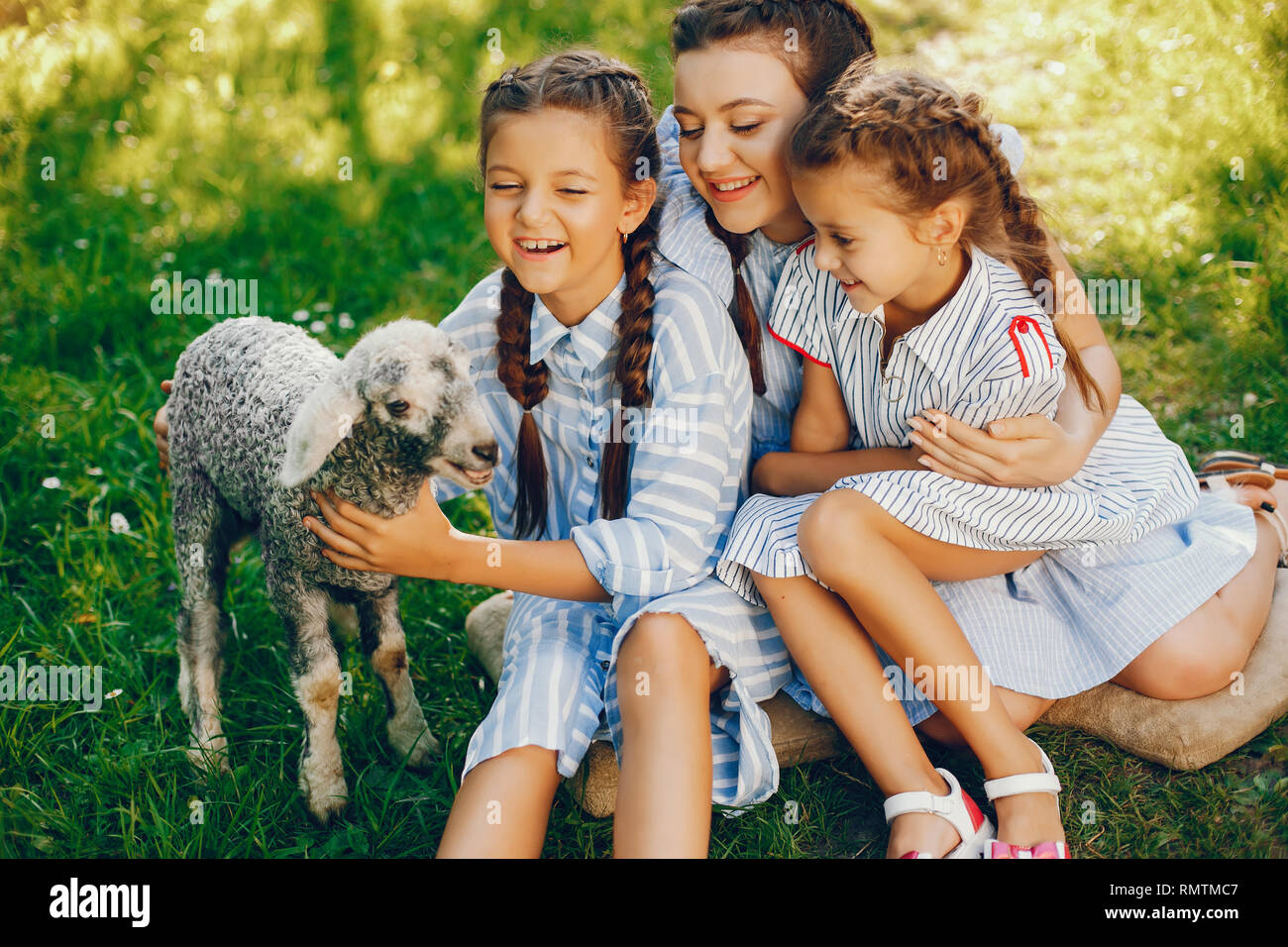 beautiful girl with goat Stock Photo - Alamy