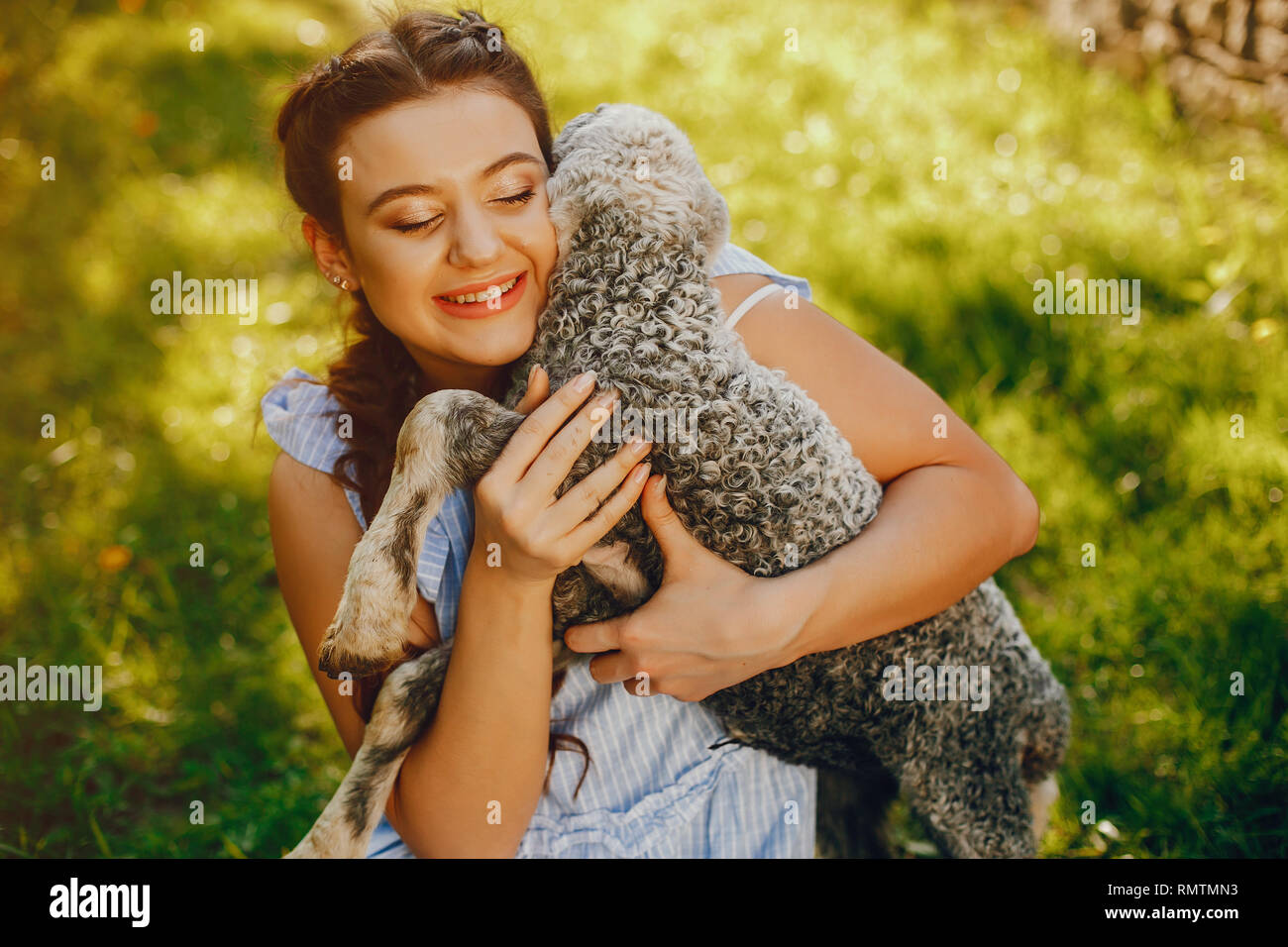 beautiful girl with goat Stock Photo - Alamy