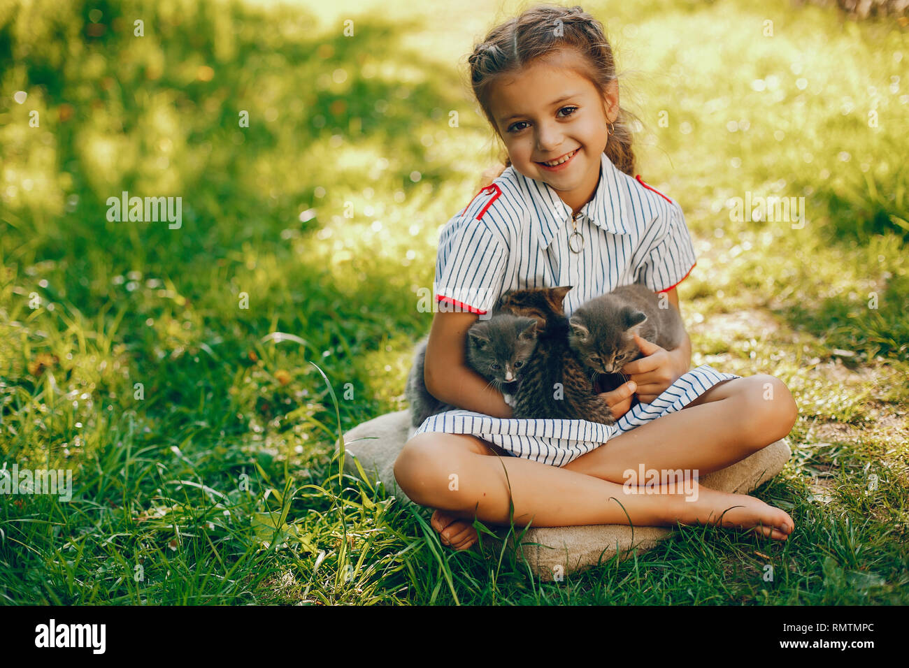 beautiful girl with cats Stock Photo - Alamy