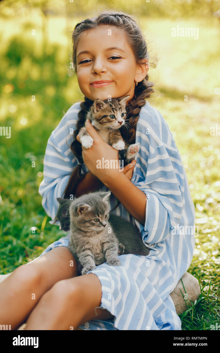 beautiful girl with cats Stock Photo - Alamy