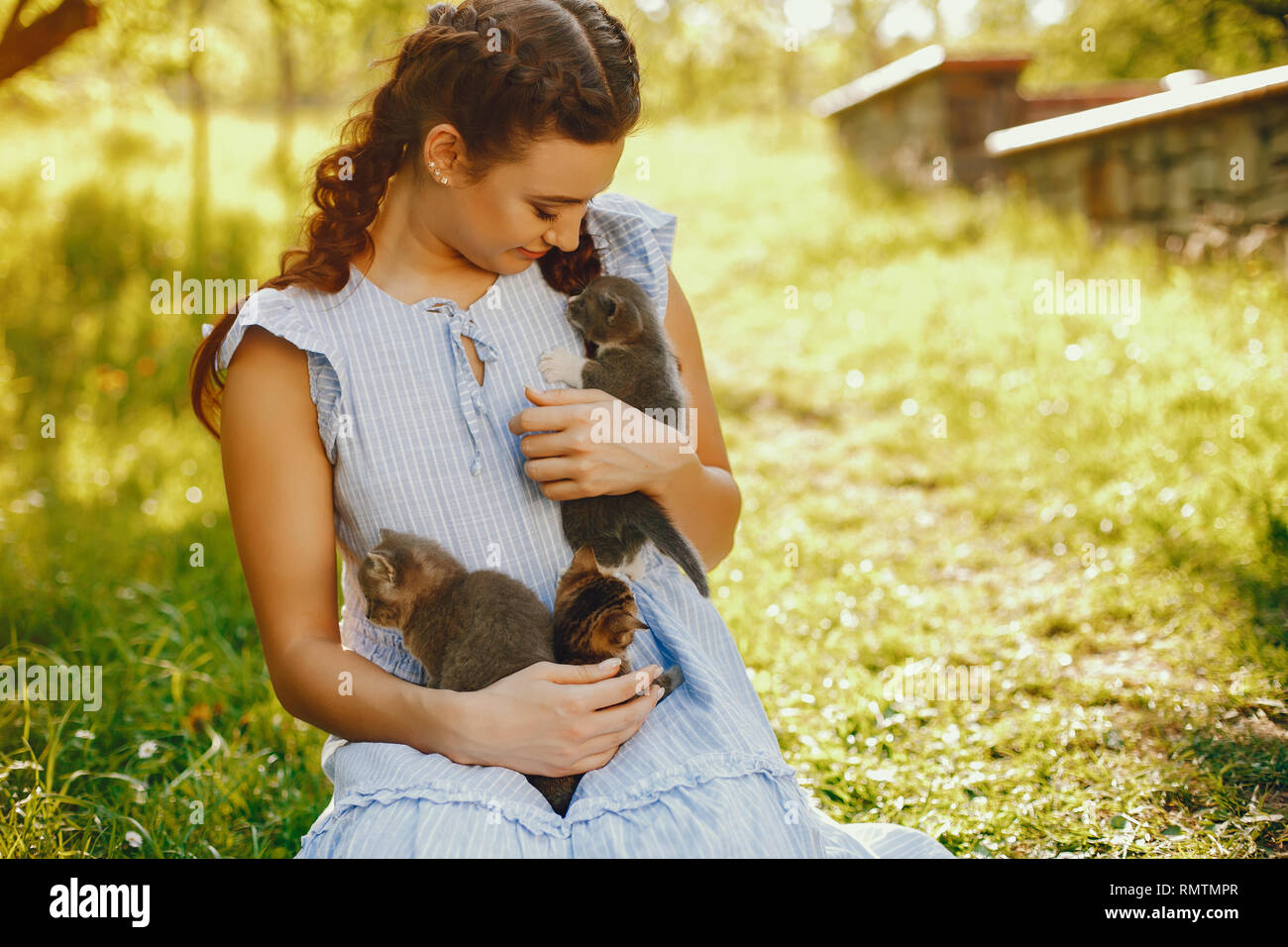 beautiful girl with cats Stock Photo - Alamy