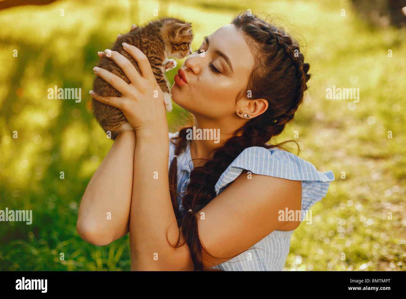 beautiful girl with cats Stock Photo - Alamy