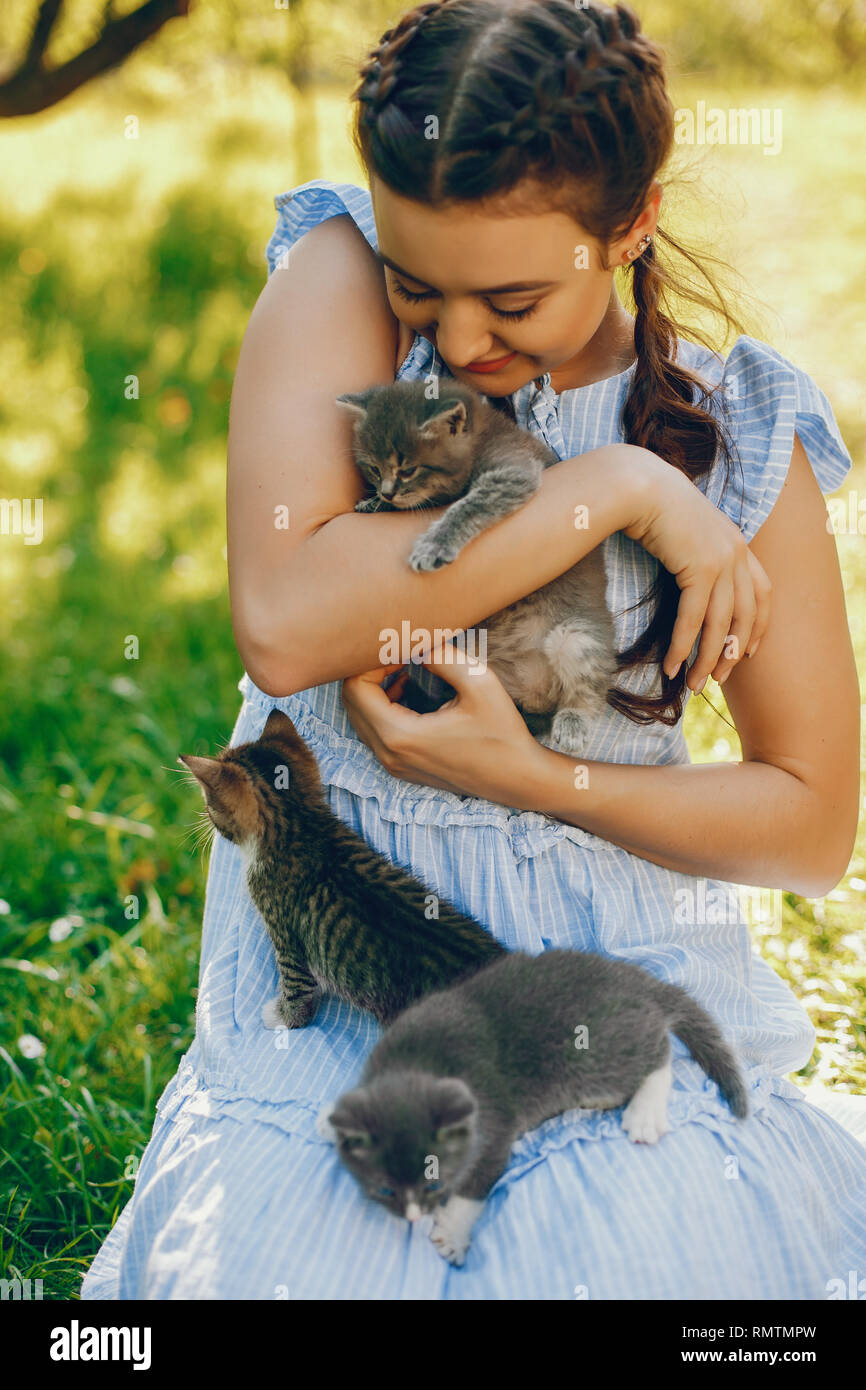 beautiful girl with cats Stock Photo - Alamy