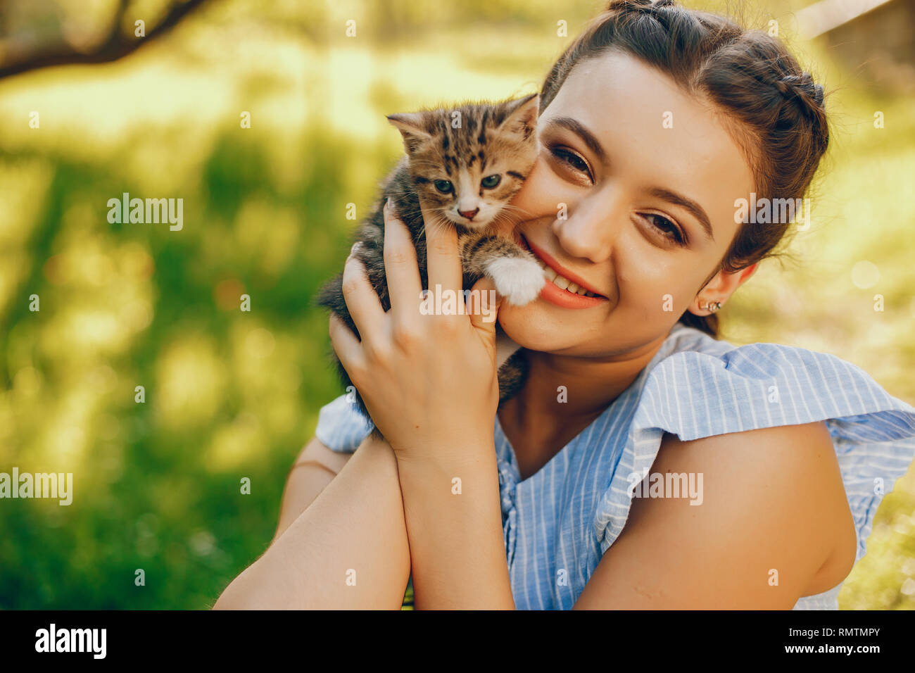 beautiful girl with cats Stock Photo - Alamy