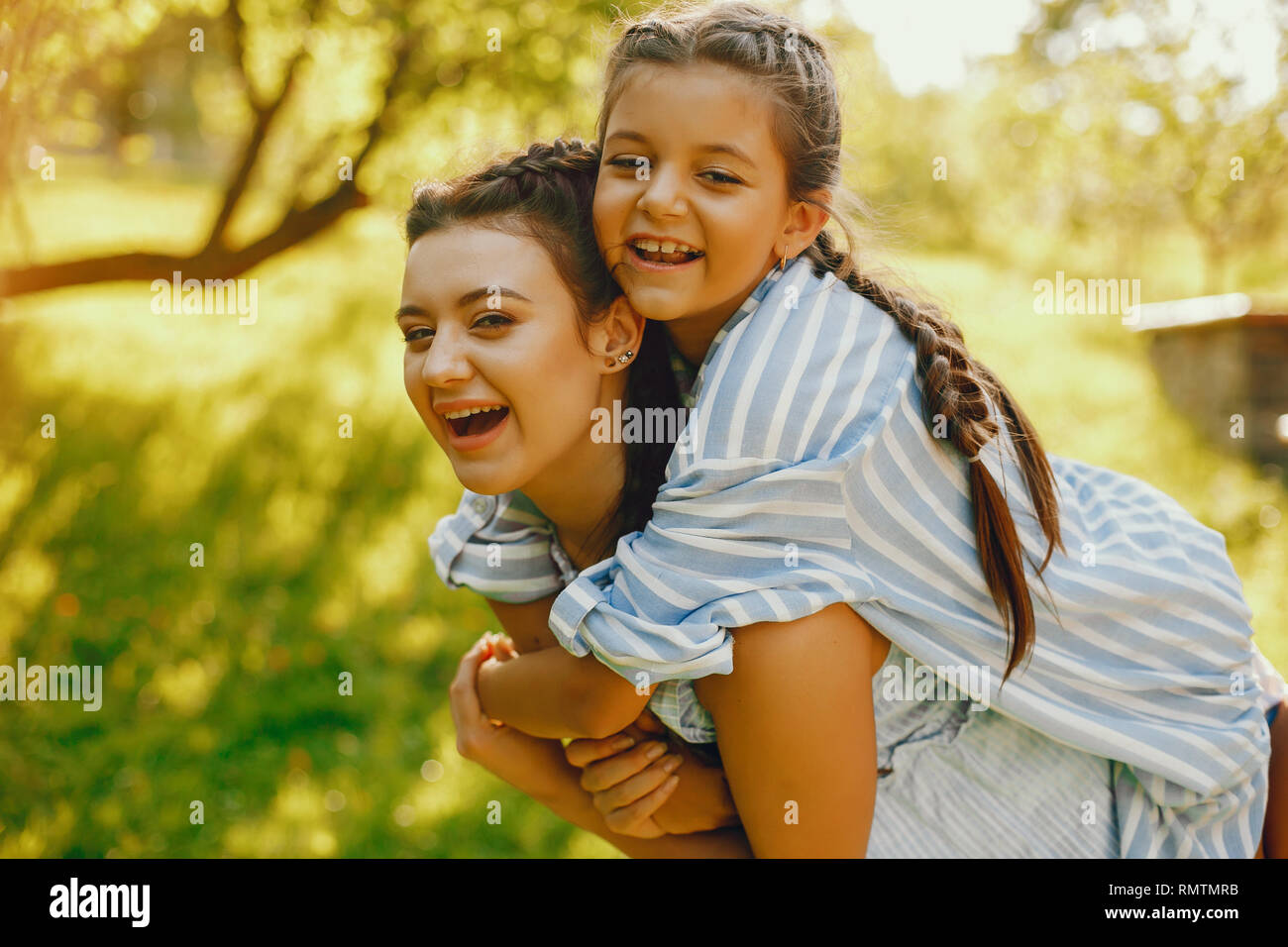 beautiful mother with pretty daughter Stock Photo - Alamy
