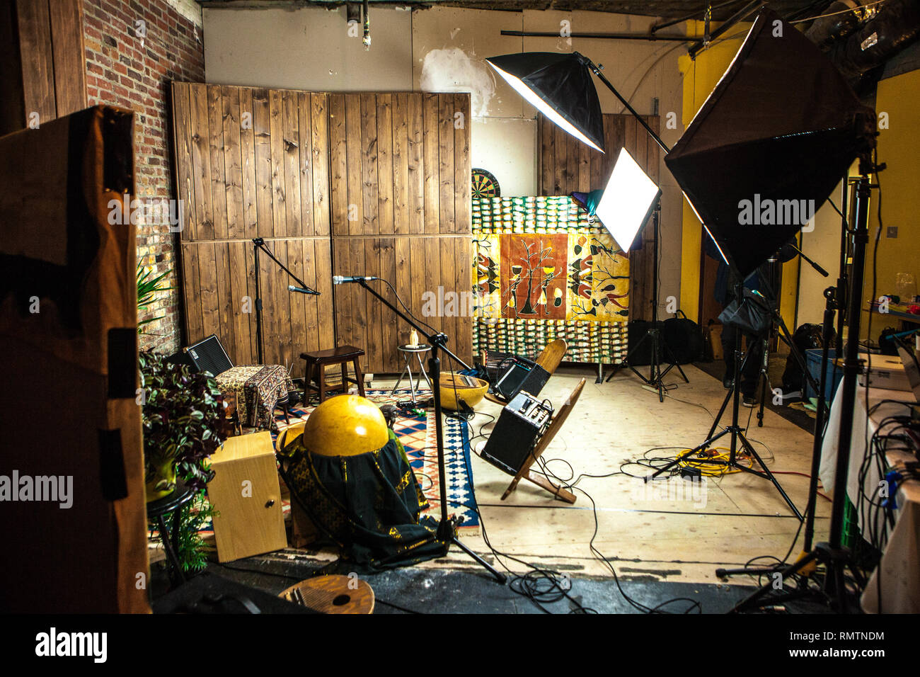 Studio setup with african musical instruments, light projectors ...