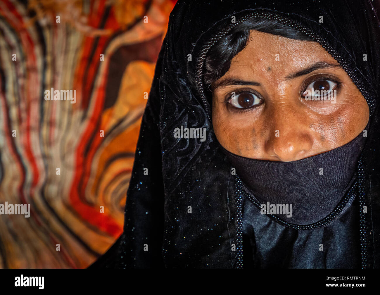 Portrait of a Rashaida tribe veiled woman inside her tent, Kassala ...