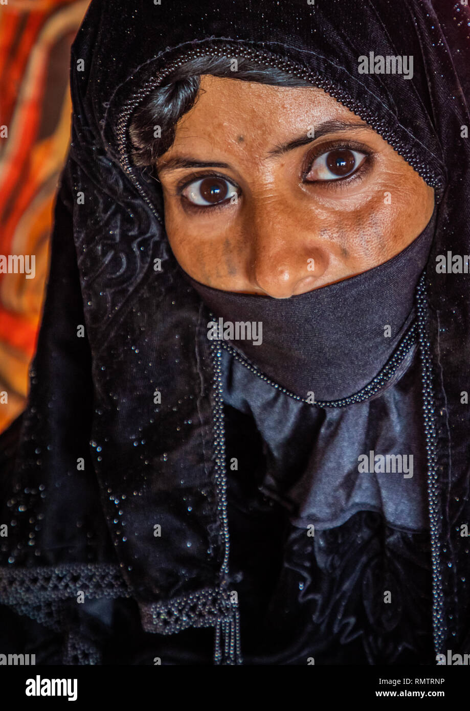Portrait of a Rashaida tribe veiled woman inside her tent, Kassala ...