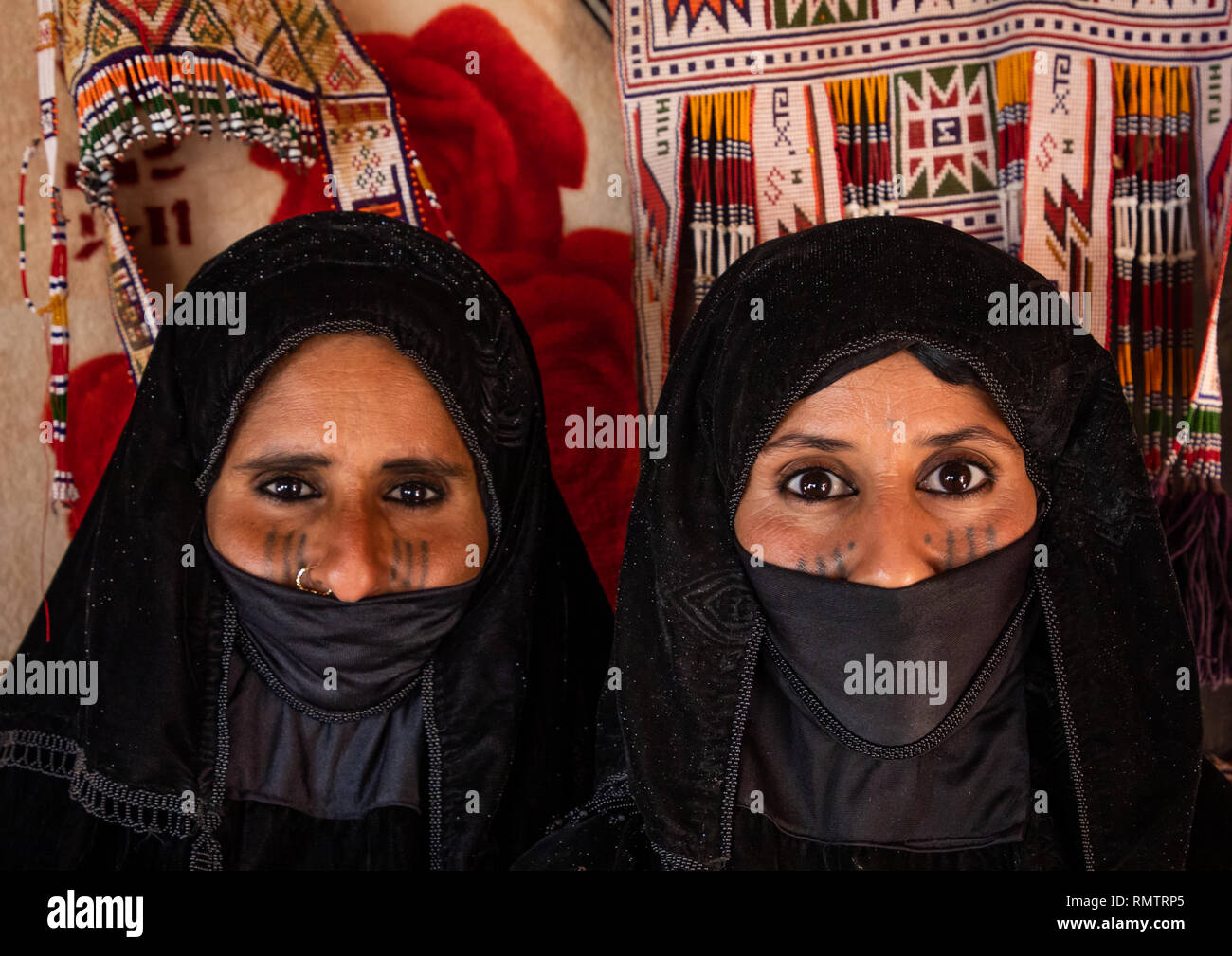 Portrait of Rashaida tribe veiled women inside a tent, Kassala State ...