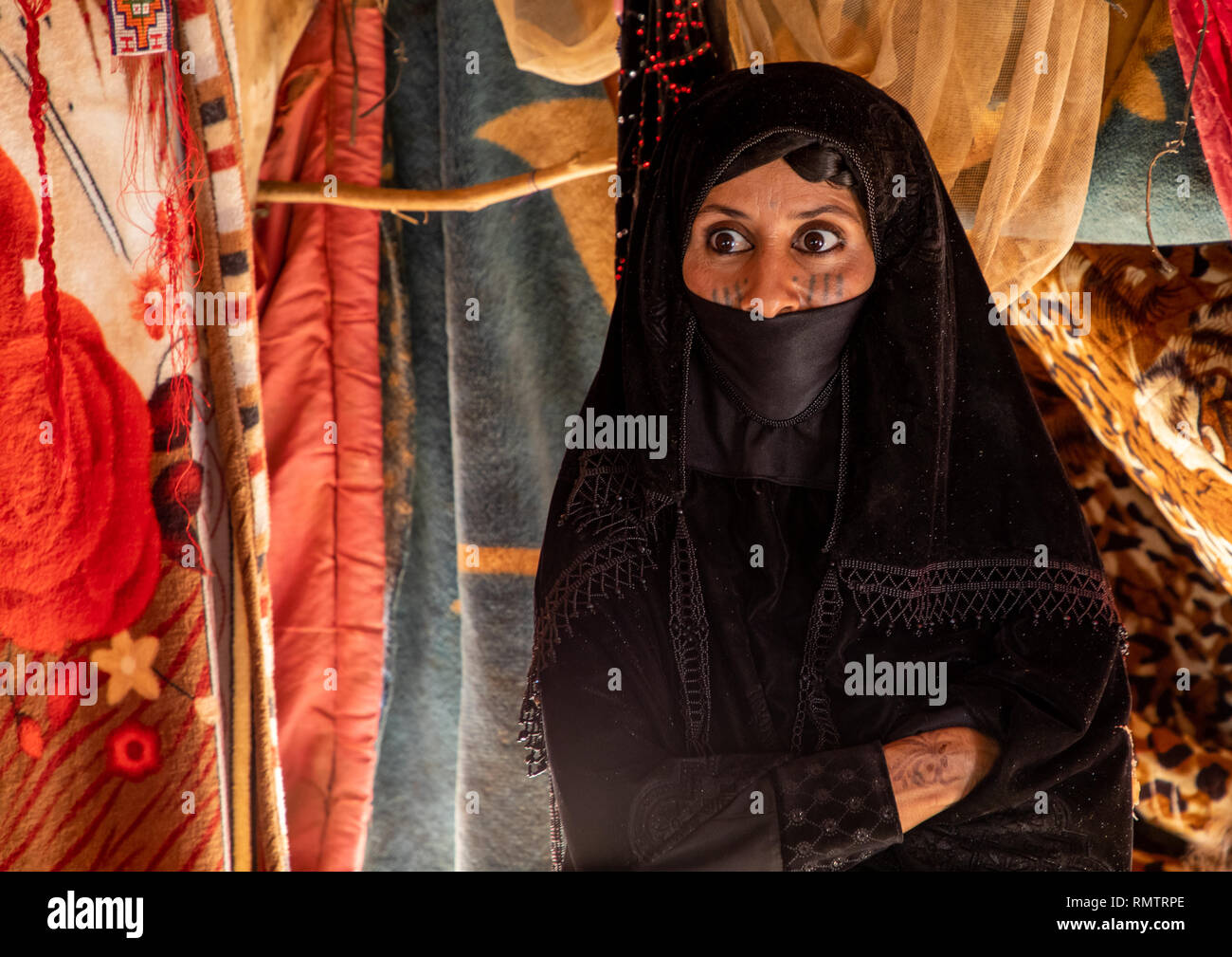 Portrait of a Rashaida tribe veiled woman inside her tent, Kassala ...