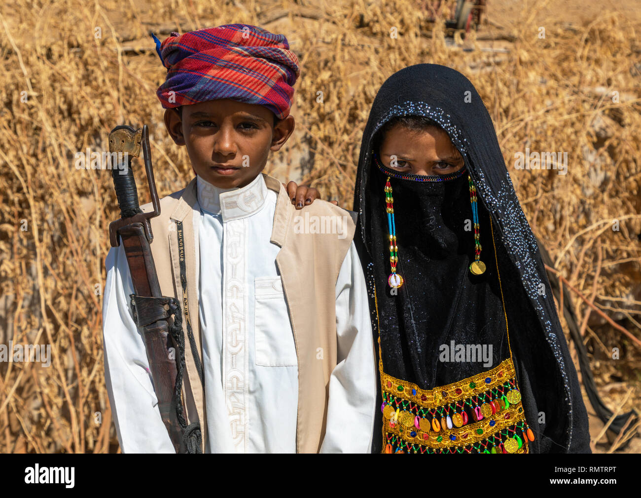 Portrait of Rashaida tribe boy and girl in traditional clothing ...