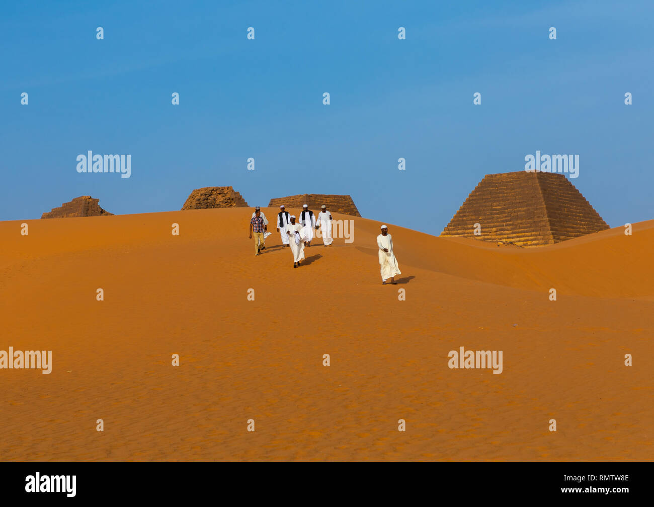 Sudanese tourists visiting the pyramids of the kushite rulers at Meroe ...