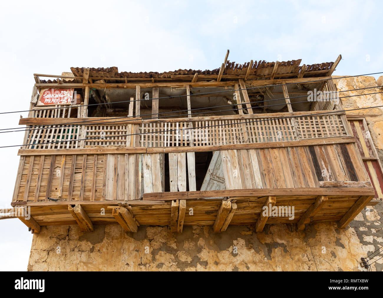 Old building with a wooden balcony on mainland, Red Sea State, Suakin ...