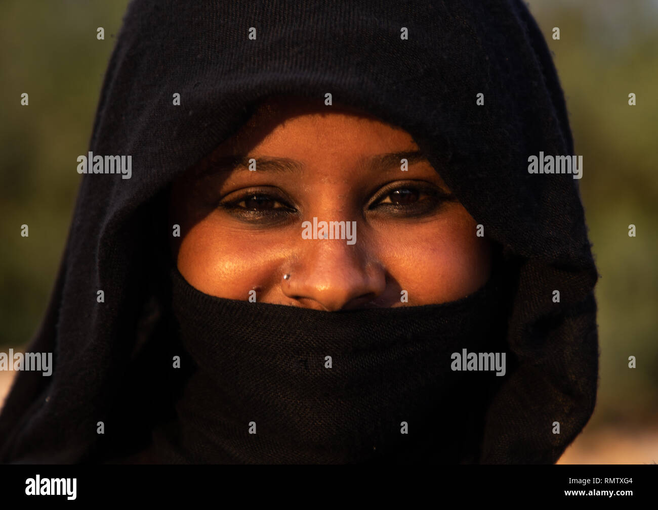 Portrait of a Rashaida tribe veiled woman, Red Sea State, Suakin, Sudan ...