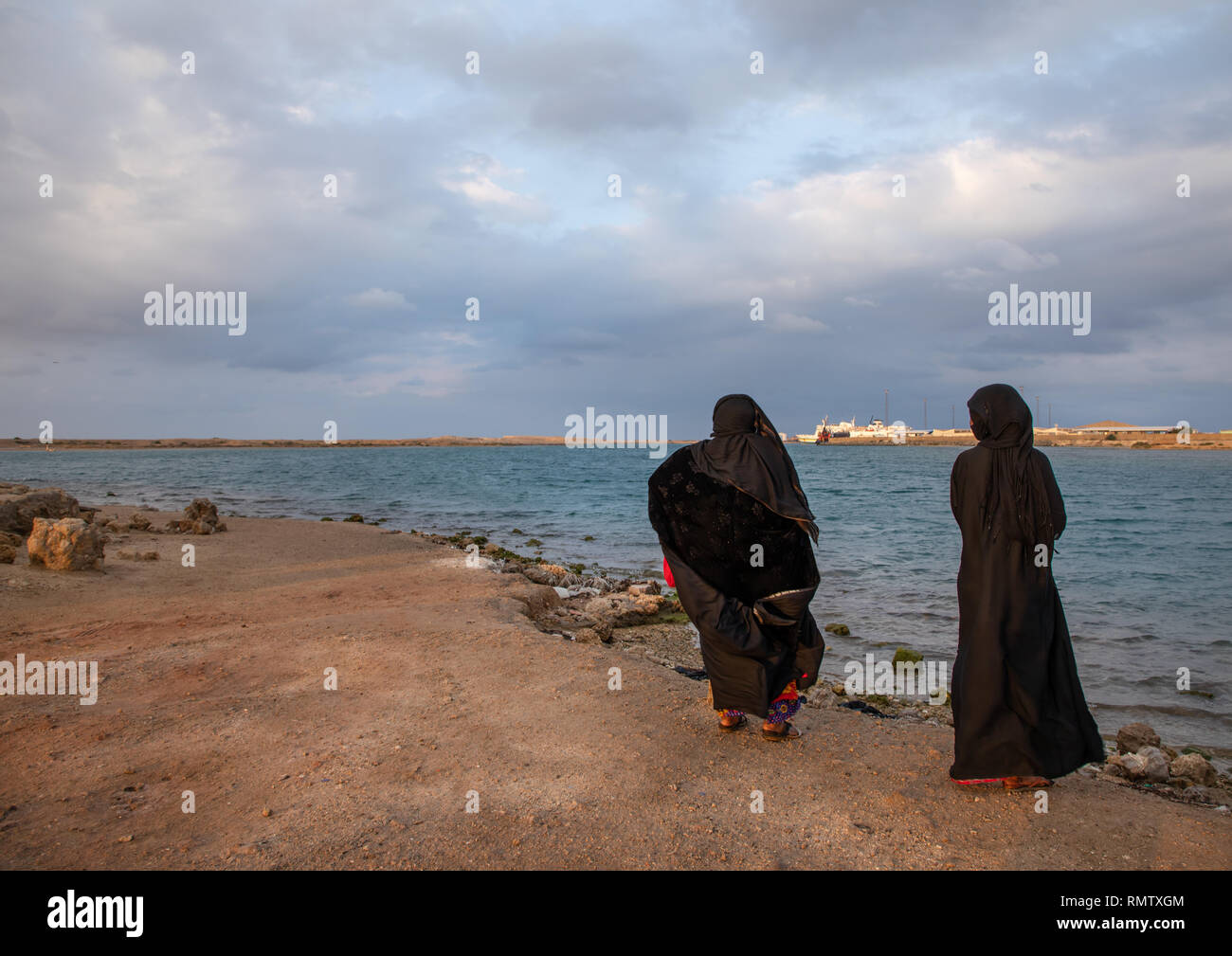 Rashaida tribe women looking at the sea, Red Sea State, Suakin, Sudan ...