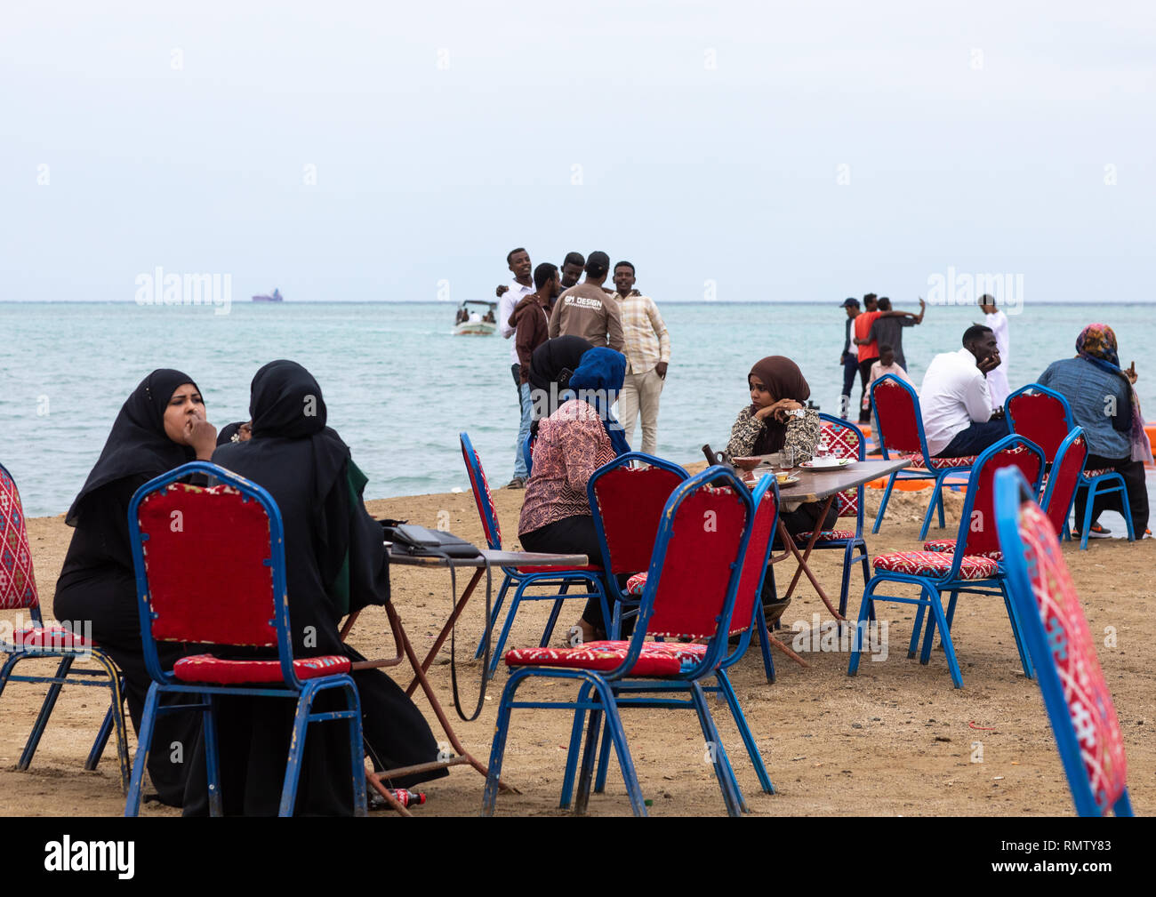 Sudanese people eating in a restaurant near the sea, Red Sea State ...