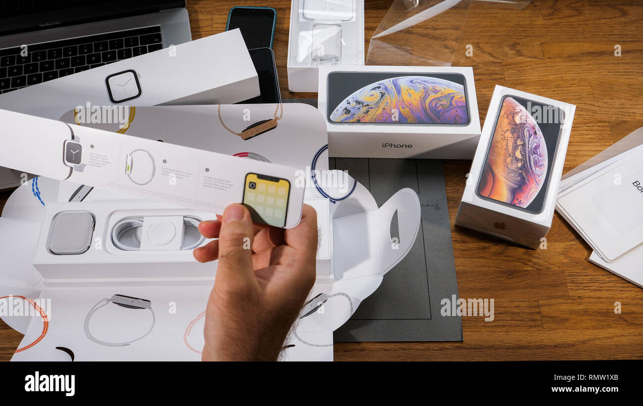 PARIS, FRANCE - SEPTEMBER 21, 2018: Apple fan boy unboxing latest new ...