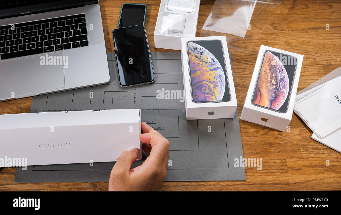PARIS, FRANCE - SEPTEMBER 21, 2018: Apple fan boy unboxing latest new ...