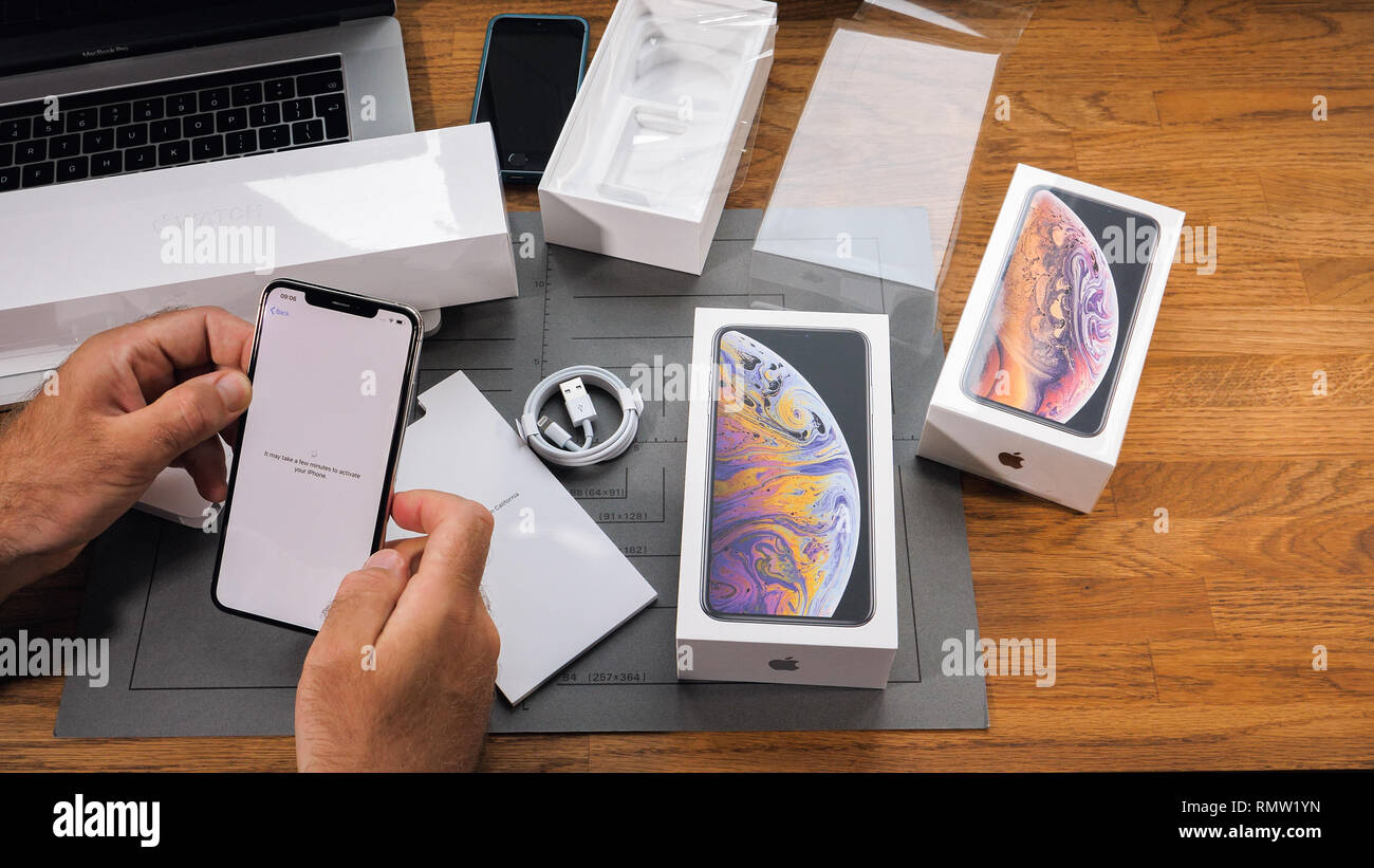 PARIS, FRANCE - SEPTEMBER 21, 2018: Apple fan boy unboxing latest new ...